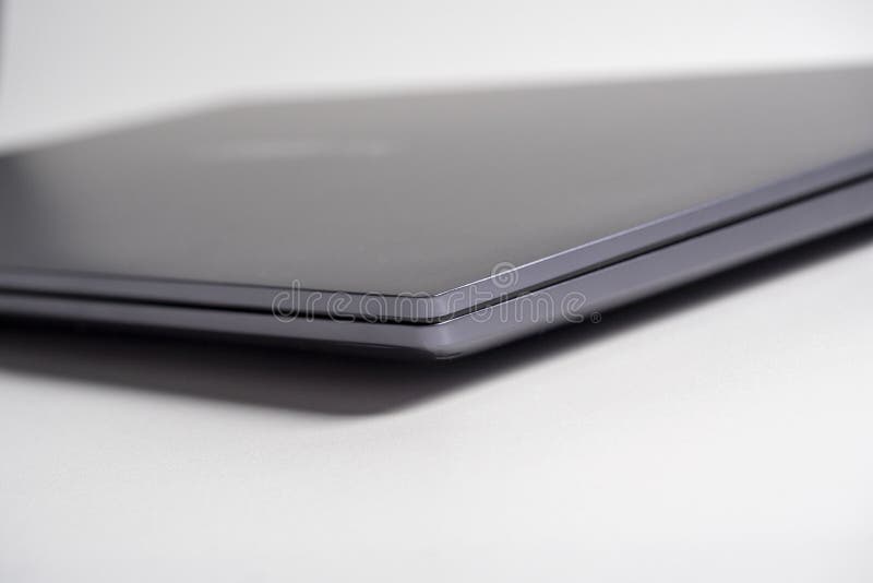 Close-up of a Gray Modern Laptop. Side View, Closed Laptop. Selective ...