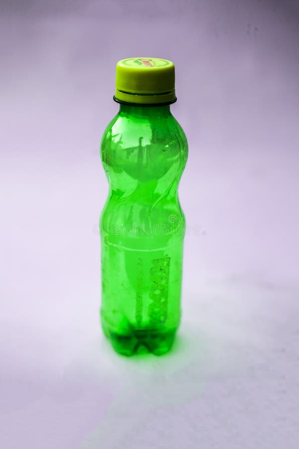 Close Up of Green Colored Small Plastic Water Bottle Isolated Stock ...