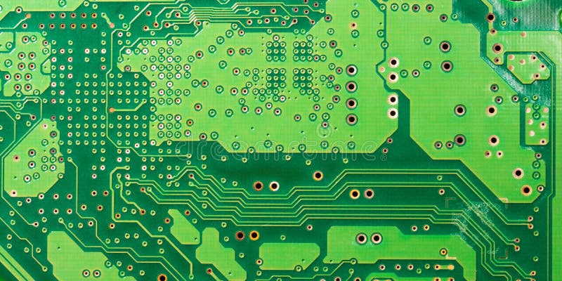 Close-up of a Green Printed Circuit Board with Electronic Components ...