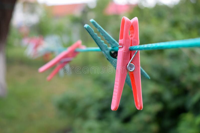 Clothes Pegs on a String - Closeup Stock Photo - Image of season ...