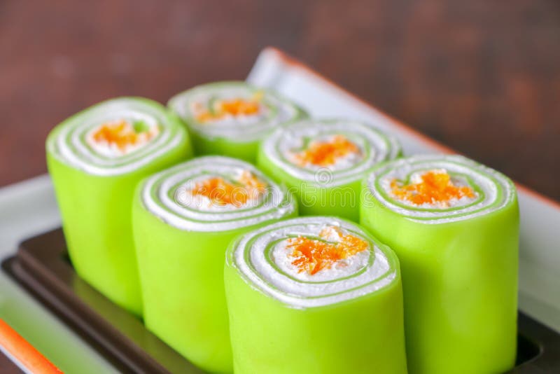 Close up green roll cake stock image. Image of decoration - 89305561