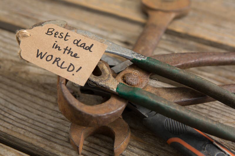 Close Up of Greetings on Rusty Work Tools Stock Image - Image of ...
