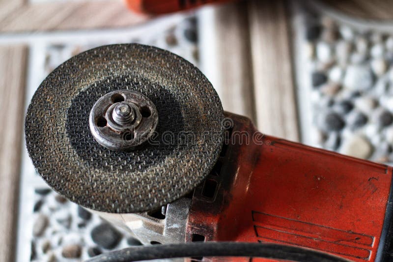 Close-up of grinding disc stock photo. Image of hand - 290833826