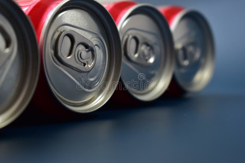 Group of Aluminium Red Cans Soft Drink Put on Blue Texture Background ...
