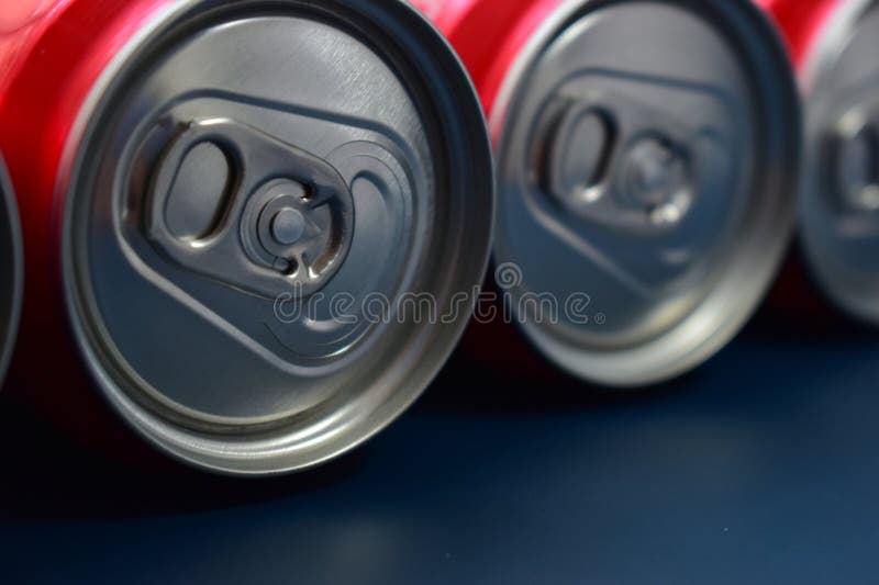 Group of Aluminium Red Cans Soft Drink Put on Blue Texture Background ...