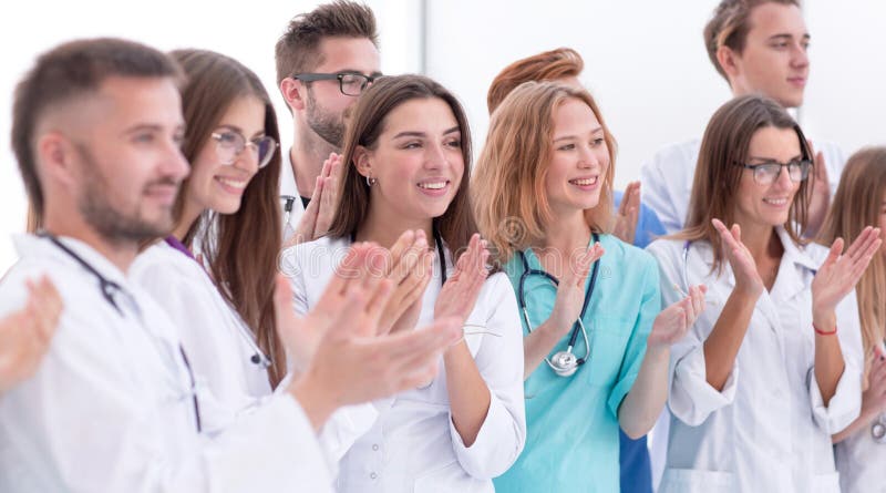 Close Up. a Group of Different Doctors Applauds Together Stock Image ...