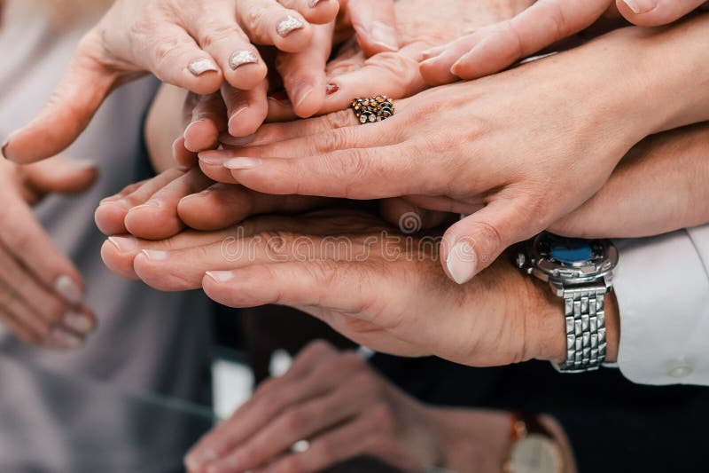 Close Up. a Group of Employees Showing Their Unity Stock Photo - Image ...