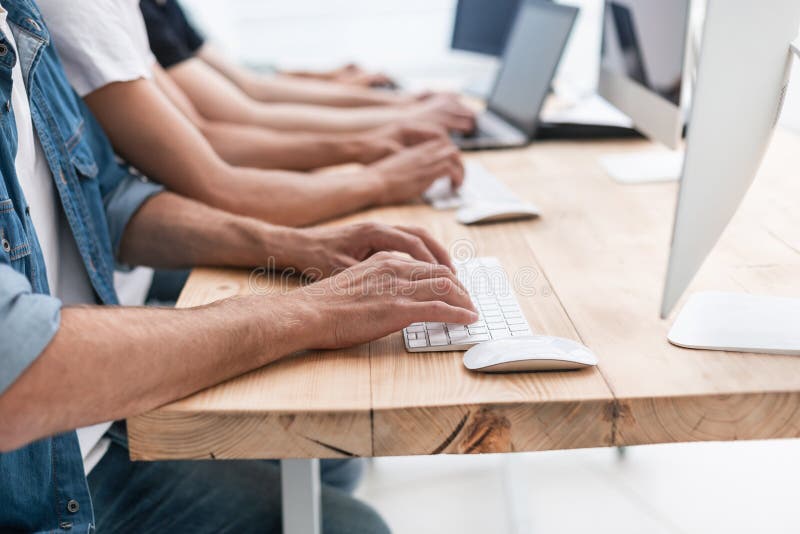 Close Up. a Group of Employees Working on Computers Stock Image - Image ...