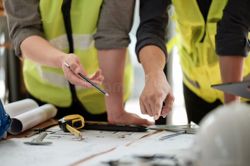 Close Up Group Engineers Discussion and Planning about Project ...