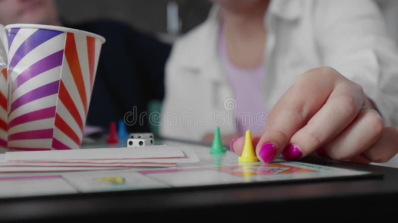 Close-up a Group of Friends are Playing a Board Game with Cards and ...