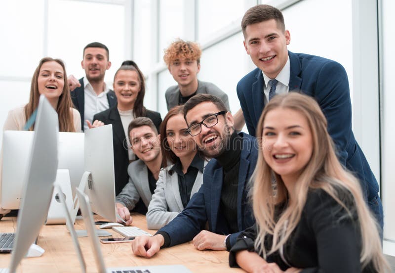 Close Up.a Group of Happy Employees in the Workplace Stock Image ...