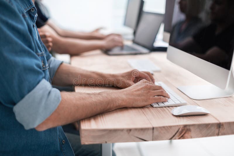 Close Up. a Group of People Work on Their Computers Stock Photo - Image ...