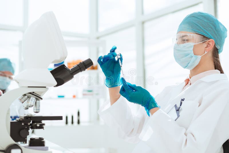 Close Up. a Group of Scientists are Testing New Drugs Stock Photo ...