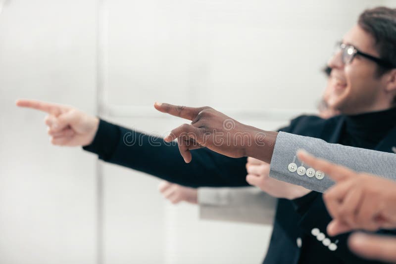Group of Smiling Business People Pointing Pointing Forward Stock Image ...