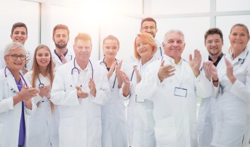 Group of Diverse Smiling Doctors Applauding Together. Stock Image ... Group of Diverse Smiling Doctors Applauding Together. Stock Image ...