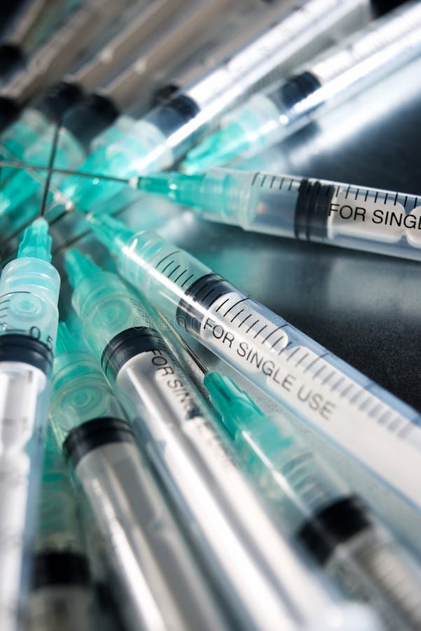 Syringes close up stock photo. Image of disposable, metal - 165050534