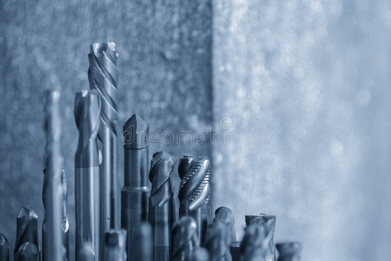 Close-up the Group of Used Cutter End Mill Tool in the Light Blue Scene ...