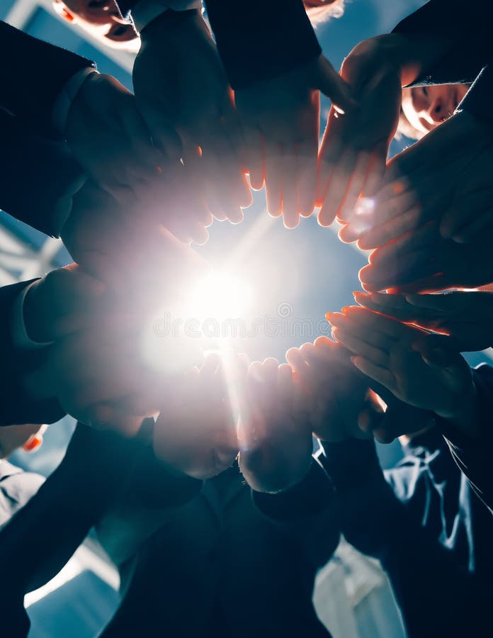 Close Up. Group of Young Business People Standing in a Circle Stock ...