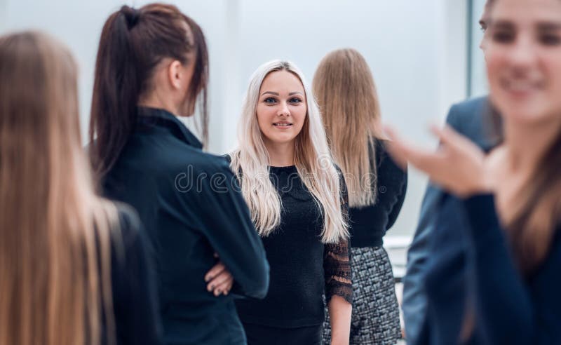 Group of Young Colleagues Talking Standing in the Office Stock Image ...