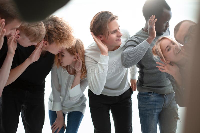 Close Up. a Group of Young People Gossip Stock Photo - Image of ...