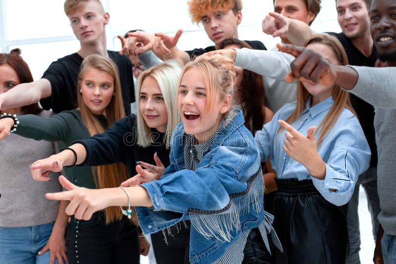 Close Up. a Group of Young People Pointing at One Point Stock Image ...