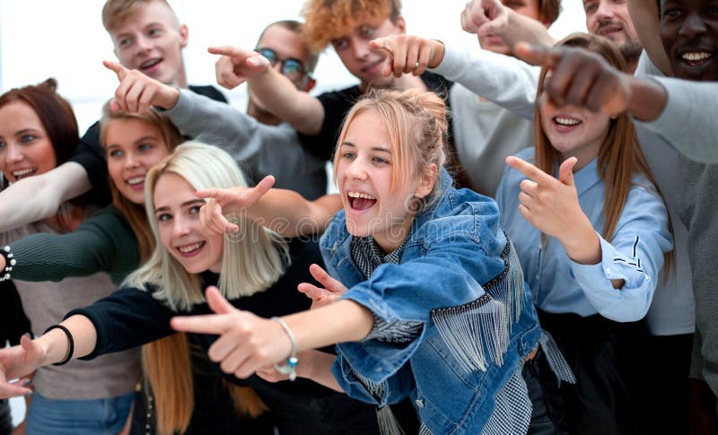 Close Up. a Group of Young People Pointing at One Point Stock Image ...