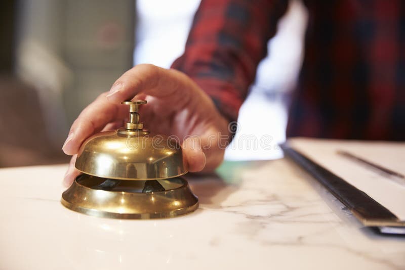 Close Up of Guest S Hand on Hotel Reception Bell Stock Photo - Image of ...