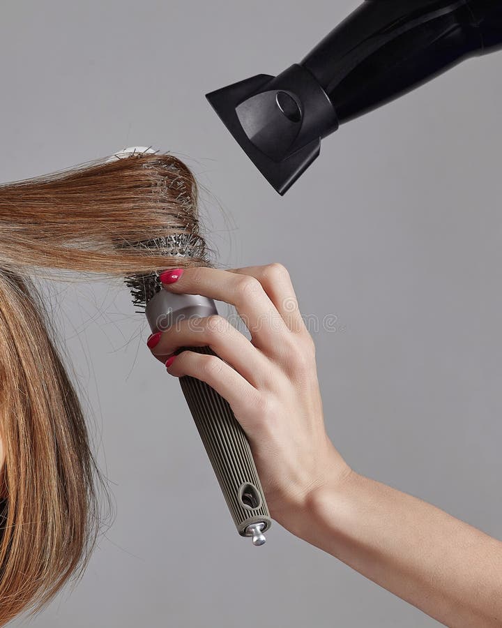 Close-up Hair Straightening with a Hair Dryer Stock Image - Image of ...