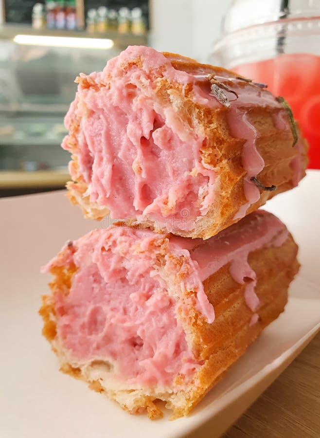 Close-up Half of Eclair with Pink Lavender Cream Stock Photo - Image of ...