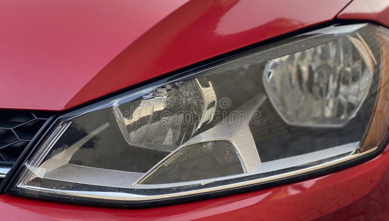 Close-up of Halogen Car Headlights on a Red Car. Car Details Stock ...