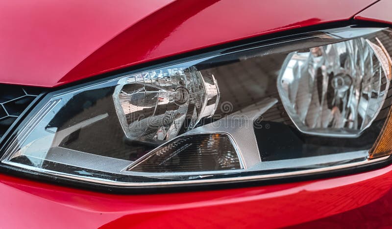 Close-up of Halogen Car Headlights on a Red Car. Car Details Stock ...