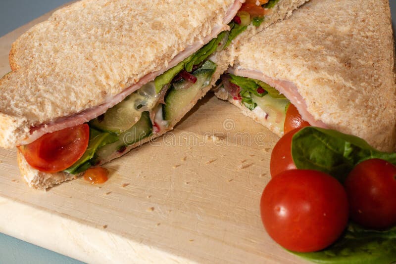 A Close Up of a Ham and Salad Sandwich Cut in Half Stock Image - Image ...