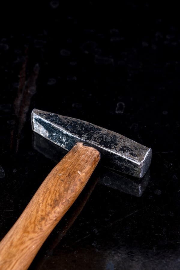 Close-up of a Hammer on a Black Table Stock Photo - Image of renovation ...