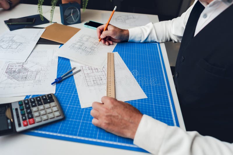Close Up of Hand of an Architect, Engineer Drawing Blueprint Stock ...