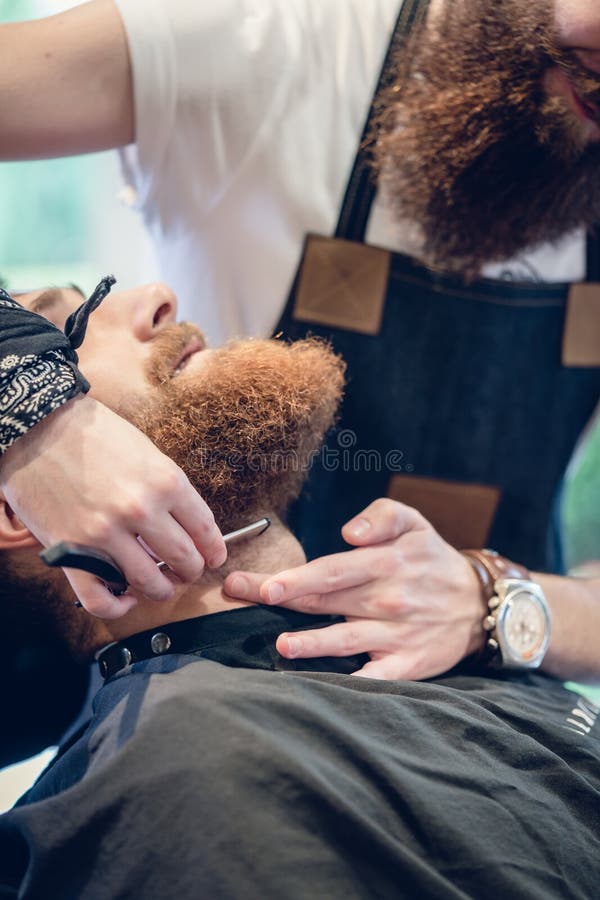 Close-up of the Hand of a Barber Using Scissors while Trimming Stock ...
