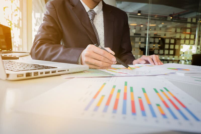 Close Up of Hand of Business Man Working Document and Laptop in Stock ...