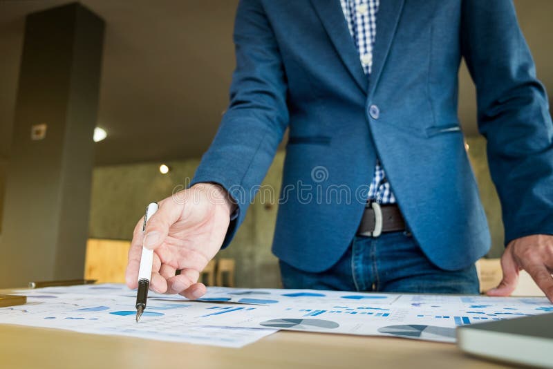 Close Up of Hand of Business Man Working Document and Laptop in Stock ...