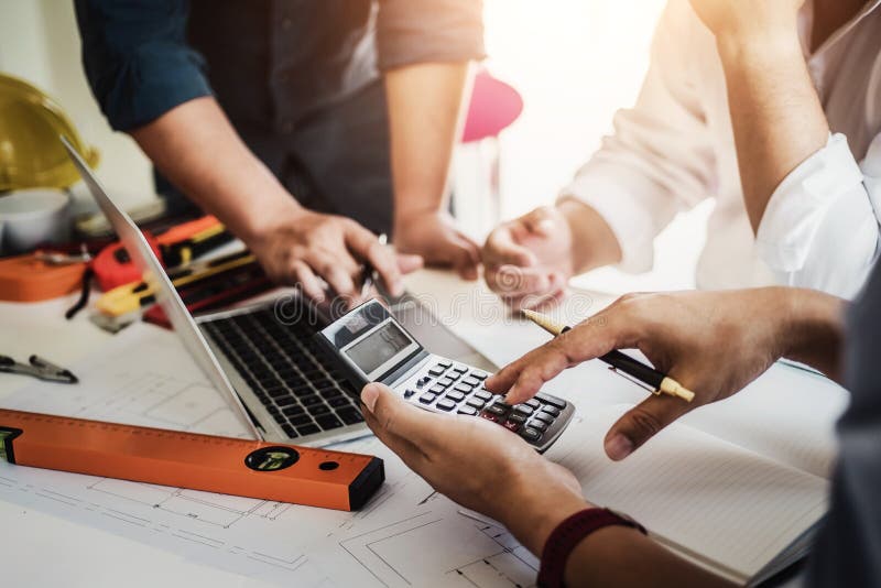 Close Up Hand of Civil Engineer or Architect Business Using Calculator ...