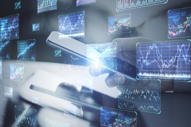 Close Up of Hand at Desktop Using Smartphone with Various Forex Screens ...