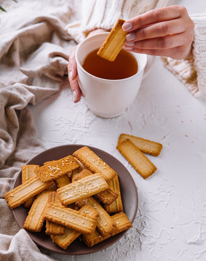 Cozy tea time with cookies stock image. Image of beige - 320763385