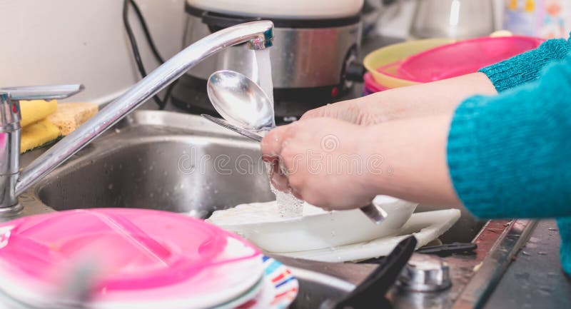 Close Up of the Hand Doing Dishes Stock Photo - Image of dirty, fork ...