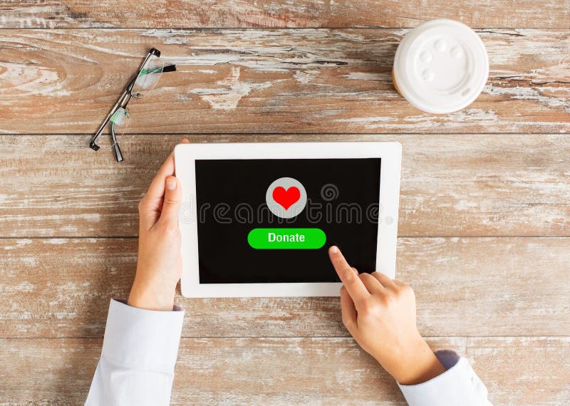 Close Up of Hand with Donate Icon on Tablet Pc Stock Image - Image of ...