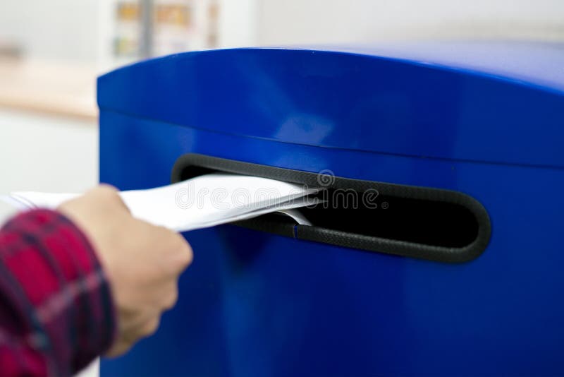 Close Up Hand Drop Letter and Documents in the Blue Postbox in Post ...