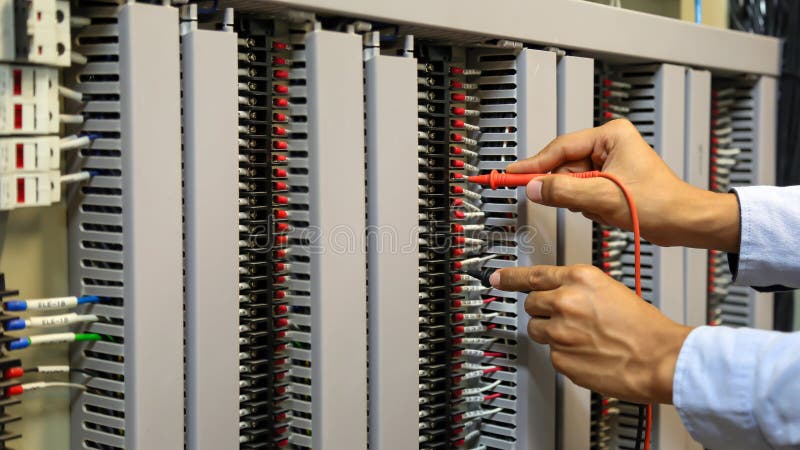 Close-up Hand of Electrical Engineer Using Measuring Equipment To ...