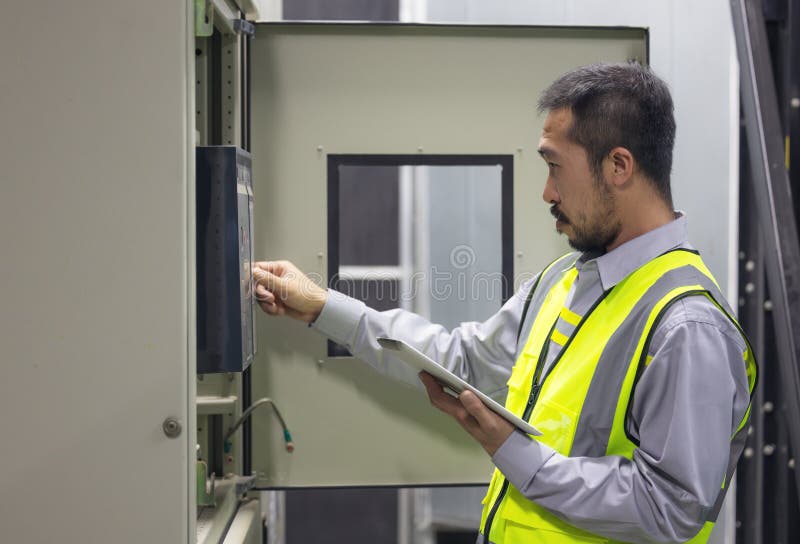Close Up Hand of Engineer or Electrician Man Working Check the ...