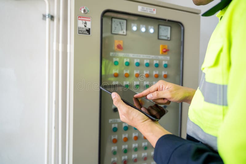 Close Up Hand of an Engineer or Electrician Working on Electrical Check ...