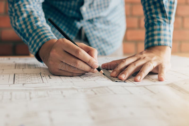 Close Up Hand Engineering Man Standing Examining Working on a Bl Stock ...