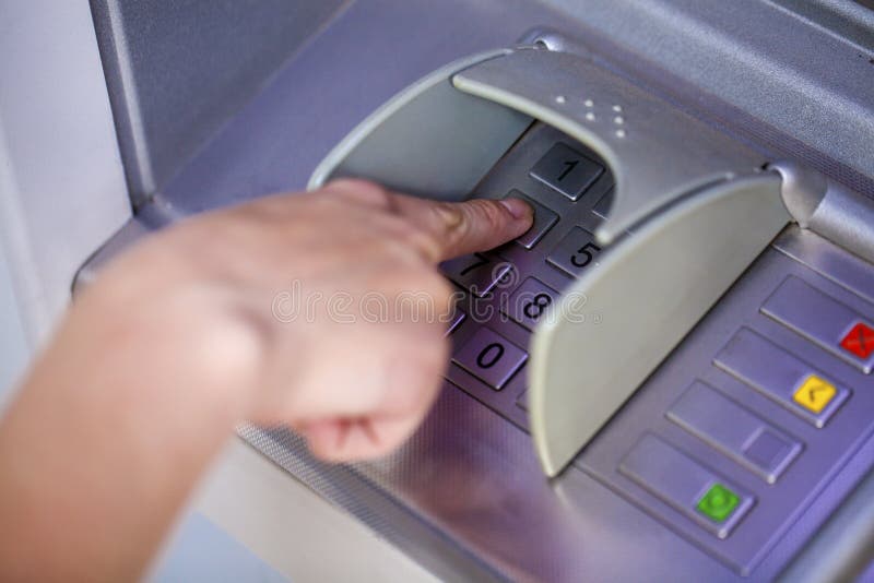 Close Up of Hand Entering Pin at an ATM. Finger about To Press a Stock ...