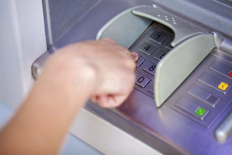 Close Up of Hand Entering Pin at an ATM. Finger about To Press a Stock ...