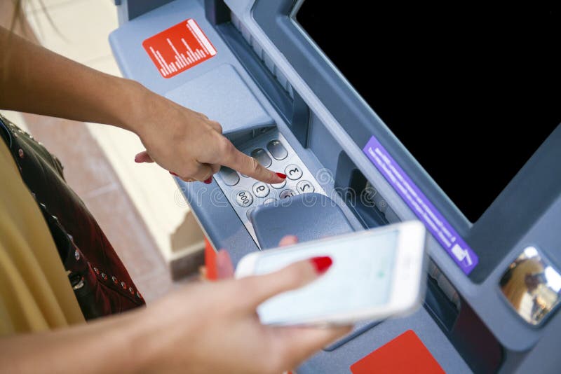 Close Up of Hand Entering Pin at an ATM. Finger about To Press a Stock ...